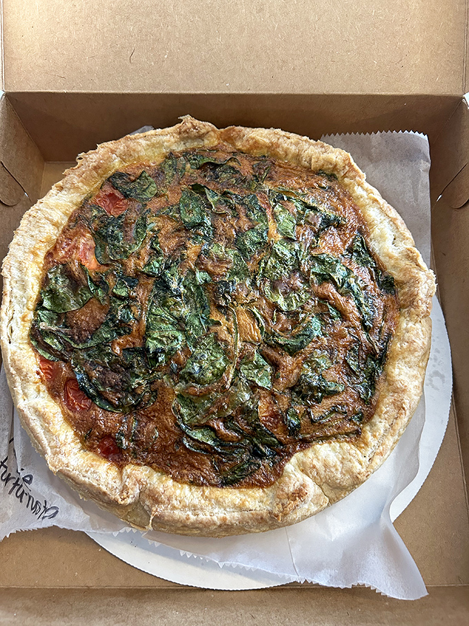 Not all heroes wear capes; some wear spinach and tomato sauce. This rustic quiche-like creation proves that vegetables can indeed be the main character.