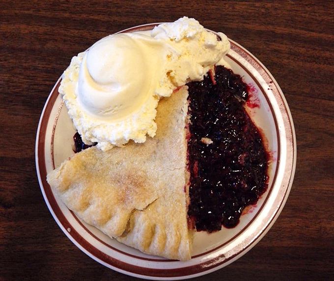 The star of the show: marionberry pie with ice cream melting into purple-black berry bliss. Oregon's official dessert, if the state had any sense.