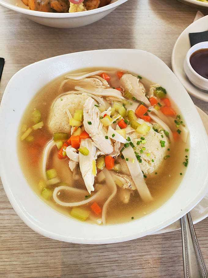 Matzo ball soup that would make your grandmother weep with joy&mdash;tender chicken, vibrant vegetables, and a matzo ball that's achieved perfect buoyancy.