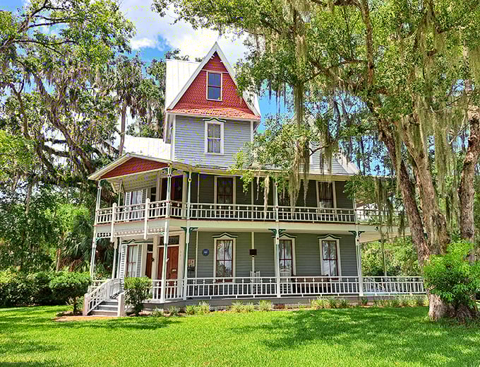 The May-Stringer House stands as Victorian elegance draped in Spanish moss, whispering stories of old Florida that no condo development could ever tell.
