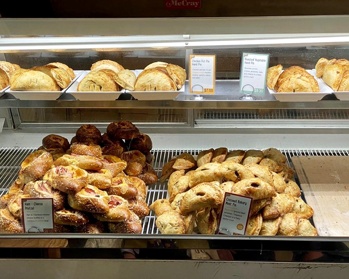 These aren't just meat pies—they're handheld masterpieces that make you question why you ever bothered with fast food drive-thrus.