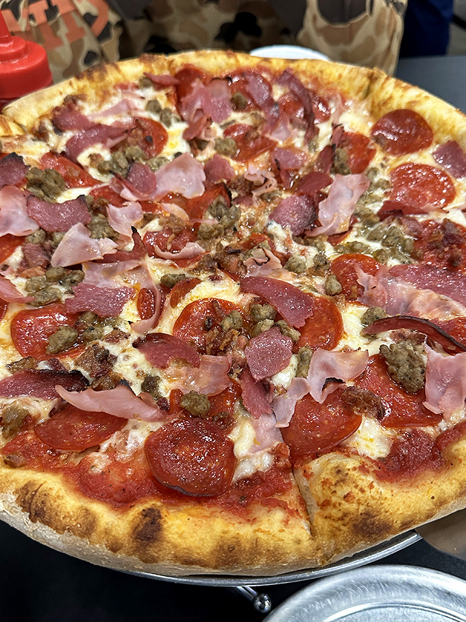 This meat lover's pizza doesn't just have toppings&mdash;it has a carnivorous congregation celebrating on a perfectly crispy crust. Vegetarians, avert your eyes.