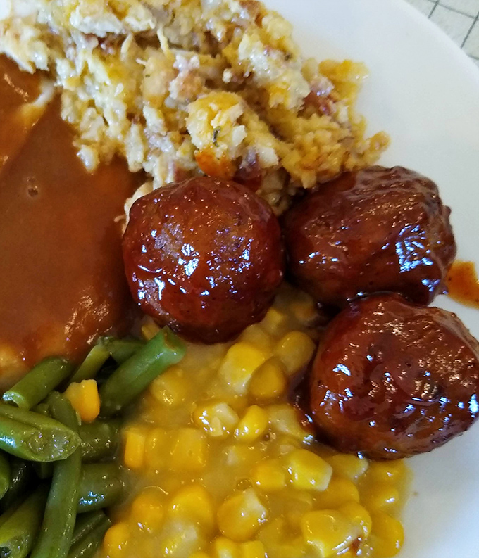 These glazed meatballs aren't just dinner, they're little ambassadors of Amish cooking philosophy: simple ingredients transformed into something extraordinary.