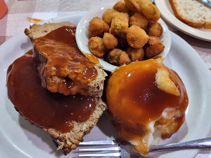 Meatloaf that would make your mother jealous, swimming in gravy that should have its own fan club. This isn't dinner&mdash;it's edible nostalgia.