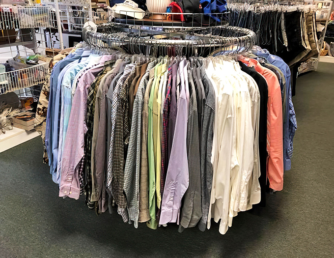 The circular men's shirt display – like a color wheel of possibility. From beach casual to boardroom ready, all without the first-owner price tag.