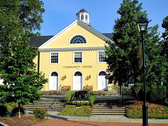 The sunny yellow Community Center stands like a cheerful neighbor, inviting you in for lemonade and gossip about who's buying which horse farm.