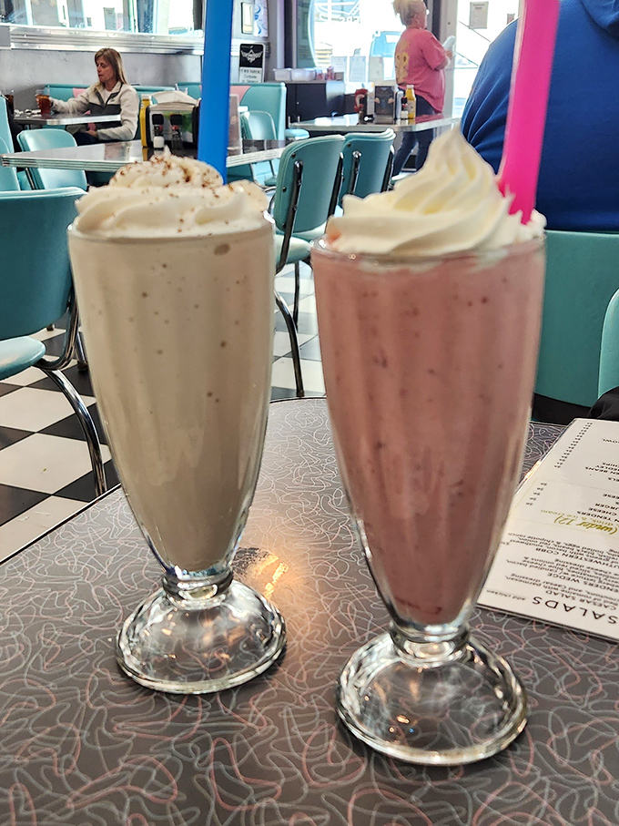 Two towering milkshakes crowned with whipped cream prove some pleasures are worth the arm workout.