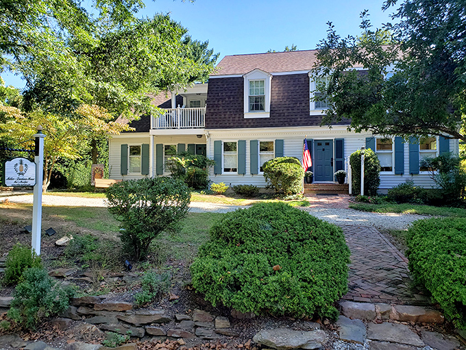 The Miller-Dunham House welcomes with classic colonial charm and meticulous landscaping. Even the shrubs look like they've been practicing their posture for centuries.