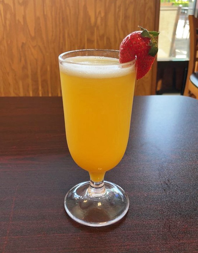 Their mimosa arrives with a fresh strawberry garnish &ndash; a simple touch that separates the breakfast amateurs from the professionals.