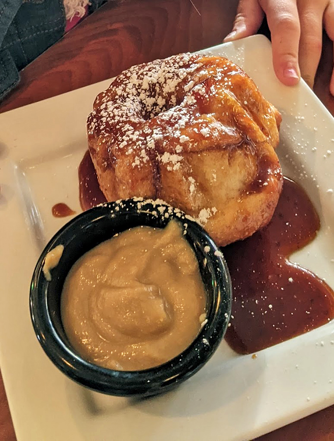 Behold the legendary monkey bread in all its glory! That vanilla cream side isn't optional&mdash;it's the perfect cool companion to this warm cinnamon masterpiece.