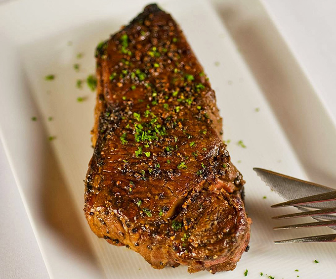 Behold the NY Strip in all its glory&mdash;perfectly seared, expertly seasoned, and ready to make you question every other steak you've ever loved.