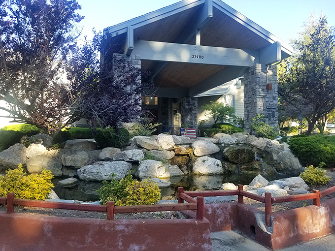 A stone fountain welcomes visitors to one of Lake Arrowhead's elegant lodges, proving that mountain retreats don't have to skimp on curb appeal.