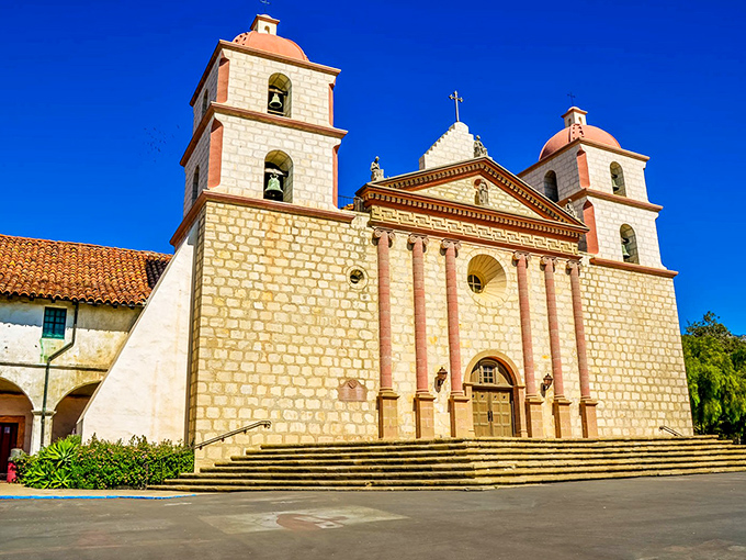 The "Queen of the Missions" stands proudly against a perfect blue sky. Santa Barbara's architectural crown jewel has been stopping visitors in their tracks since 1786.