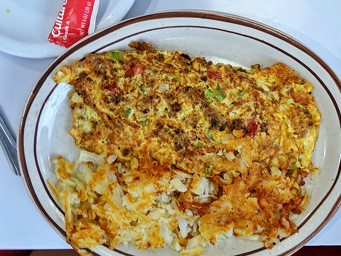 Behold the omelet that launched a thousand return visits&mdash;a fluffy masterpiece that makes ordinary eggs seem like they're not even trying.