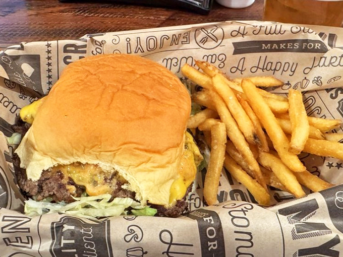 Behold the classic onion burger in its natural habitat&mdash;perfectly smashed, with cheese melted just right, and fries that could start their own fan club.