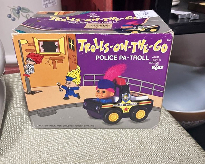 Before they became rainbow-haired movie stars, Trolls policed the neighborhood in tiny squad cars. The 60s were weird.