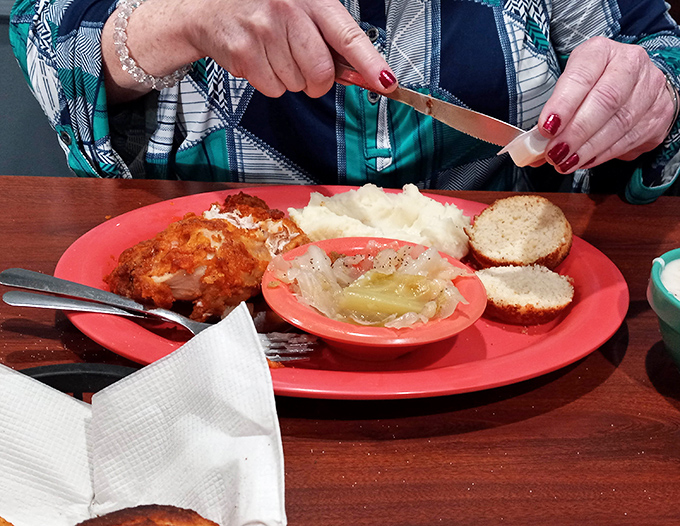 Golden-crusted oven-fried chicken paired with creamy mashed potatoes and cornbread &ndash; a holy trinity of Southern comfort that makes taste buds stand at attention.