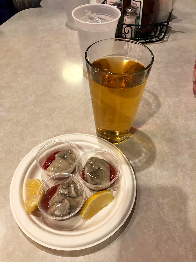 Fresh oyster shooters arrive with a splash of cocktail sauce&mdash;a briny, three-bite symphony that's the perfect prelude to seafood bliss.