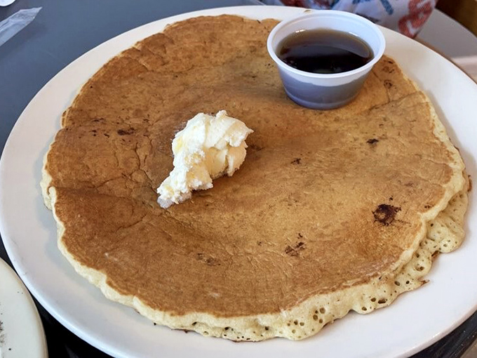 This pancake isn't just big&mdash;it's the size of a frisbee with the structural integrity of a cloud. Butter melting like a summer romance.