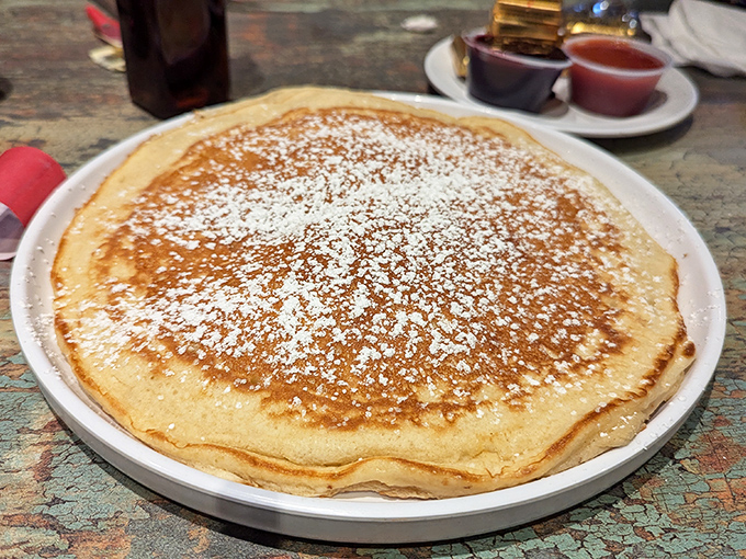 Behold the pancake that launched a thousand road trips&mdash;perfectly golden, impossibly fluffy, and dusted with sweet snow.