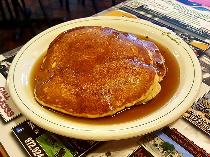 Golden-brown pancakes swimming in syrup&mdash;the kind that make you question whether you've ever truly experienced breakfast before this moment.