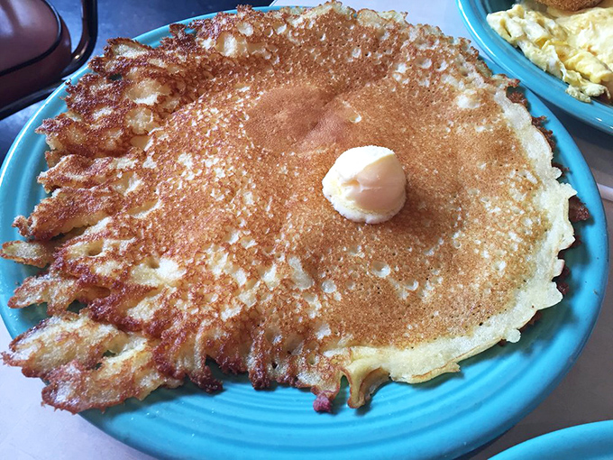 Behold the famous hotcake in its natural habitat&mdash;crispy-edged, butter-crowned, and ready to ruin all other pancakes for you forever.