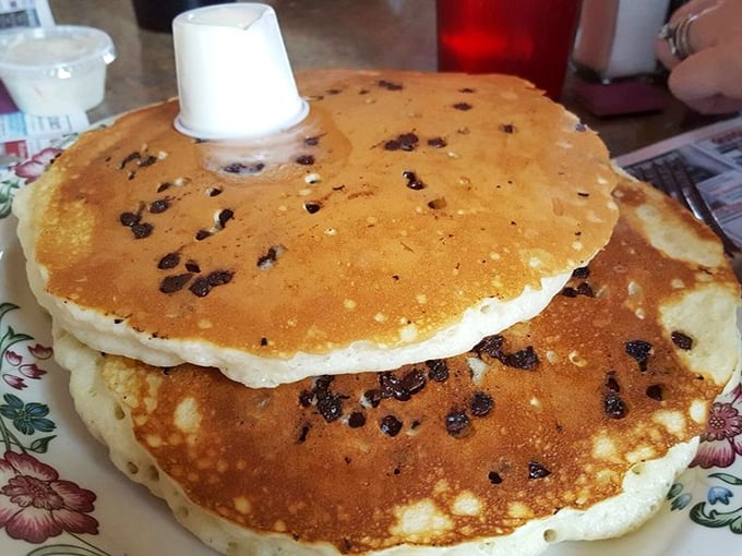 Chocolate chip pancakes that make you question every life decision that didn't involve ordering them sooner. Golden-brown perfection with melty chocolate treasures throughout. 
