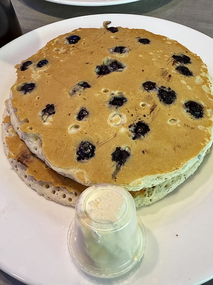 These blueberry pancakes aren't just breakfast&mdash;they're edible therapy stacked three high with bursts of berry goodness in every bite.