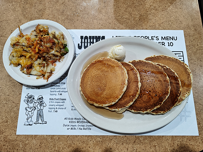 Golden-brown pancake perfection with a side of crispy hash browns. Breakfast doesn't get more presidential than this ticket to carb paradise.