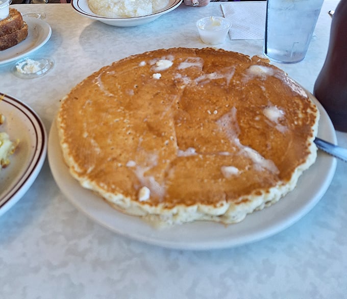 This pancake isn't just big&mdash;it's the solar system of breakfast foods, with butter creating its own delicious melt zone in the center.