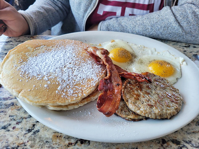 This plate could double as a breakfast buffet &ndash; those pancakes are fluffier than a cumulus cloud.
