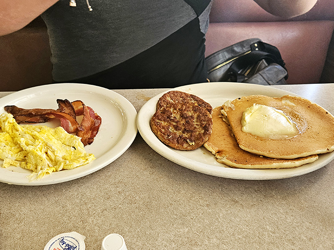 Pancake perfection doesn't need fancy presentation. That melting pat of butter creating a golden pool is breakfast's equivalent of a sunset over the ocean.