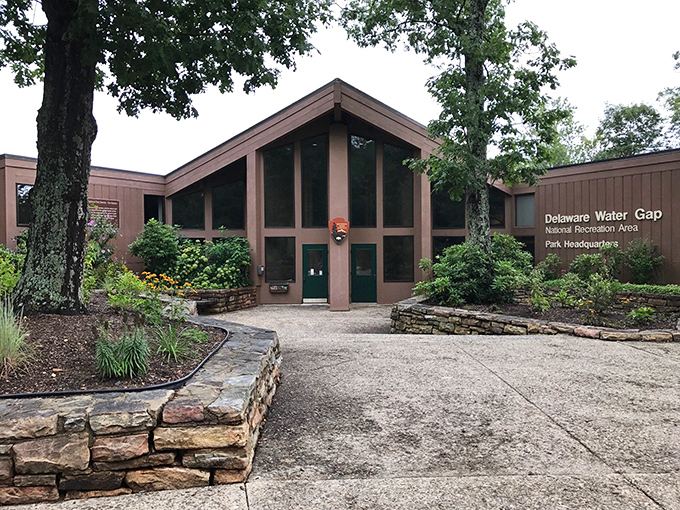 The Park Headquarters welcomes visitors with rustic charm and promises of adventure maps that will inevitably be folded incorrectly forever after.