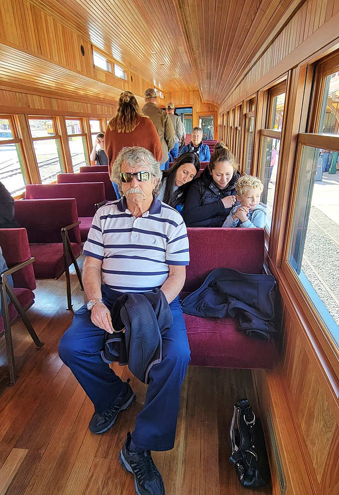 Multi-generational magic unfolds inside these wooden coaches, where smartphones temporarily lose their gravitational pull on younger passengers.
