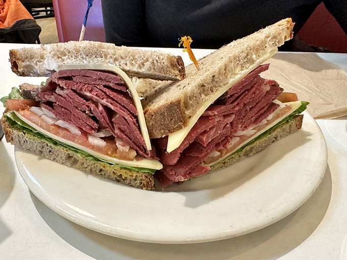 This isn't just a sandwich&mdash;it's an architectural marvel of perfectly stacked pastrami, the meat-to-bread ratio that dreams are made of.