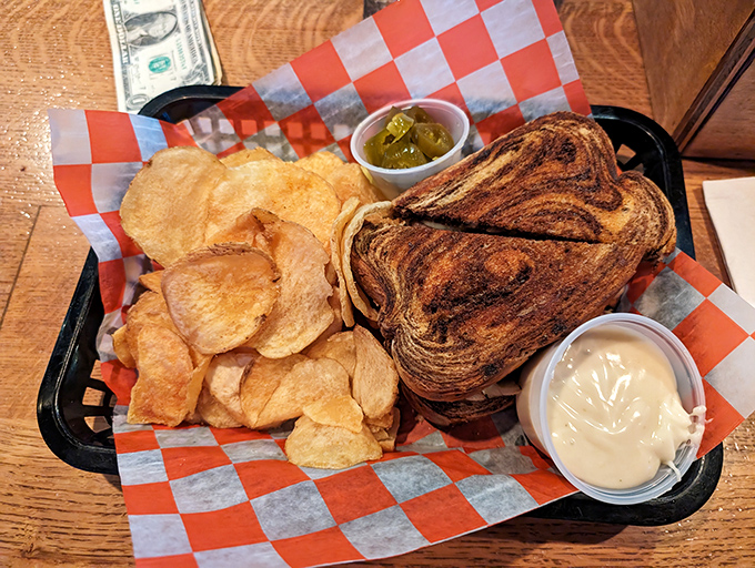 Behold the humble patty melt – a marriage of grilled bread, melted cheese, and beef that proves simple food done right is culinary poetry.