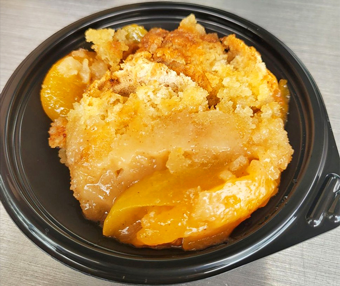 The legendary peach cobbler that launched a thousand road trips&mdash;golden, bubbling, and worth every mile of the journey to get here.