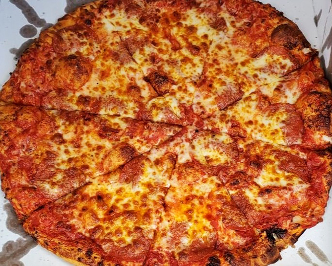 A pepperoni pizza that doesn't mess around—crispy-edged, properly blistered, and generous with toppings that actually taste like something.