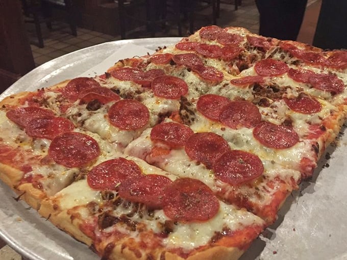 Behold the rectangular masterpiece that's converted more pizza skeptics than a Super Bowl commercial for pepperoni.