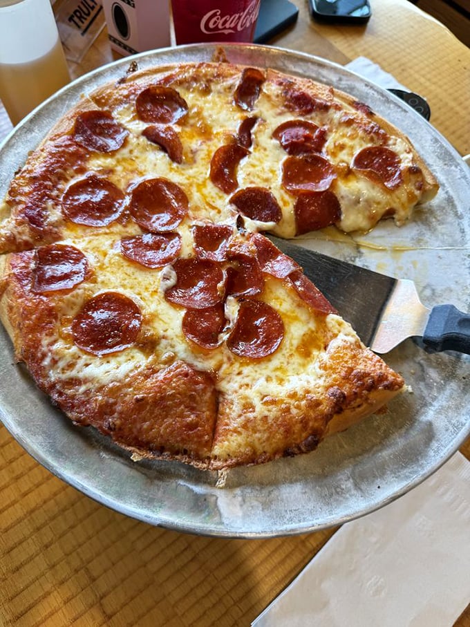 That pepperoni isn't just topping the pizza, it's performing a crispy, curled-edge ballet of perfection.