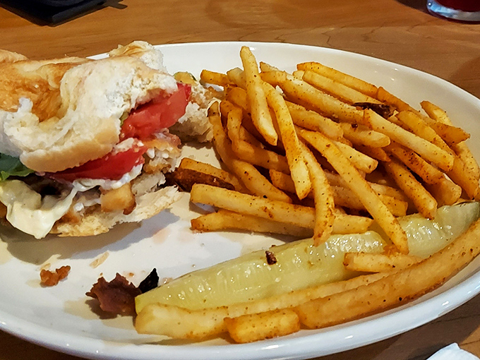 The legendary perch sandwich in all its glory &ndash; perfectly golden, impossibly fresh, and served with fries that deserve their own fan club.