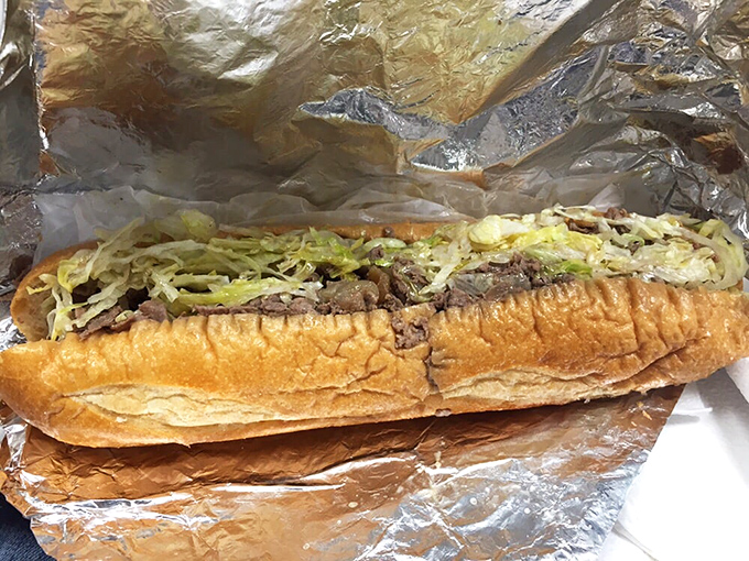 Behold the star of the show: thinly sliced beef, perfectly grilled onions, and melted cheese cradled in a roll that's both sturdy and yielding&mdash;sandwich architecture at its finest.