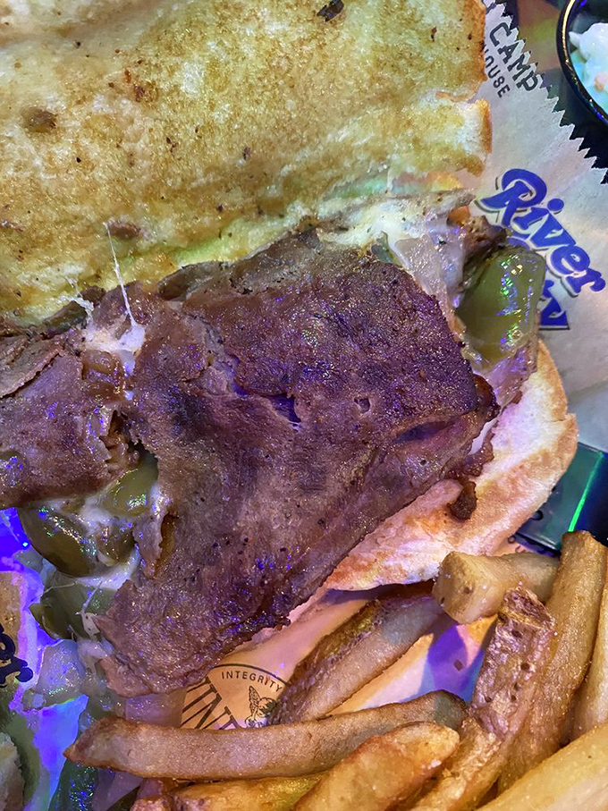 This Philly cheesesteak isn't trying to win beauty contests&mdash;it's too busy making people involuntarily close their eyes and mumble "oh my god" between bites.