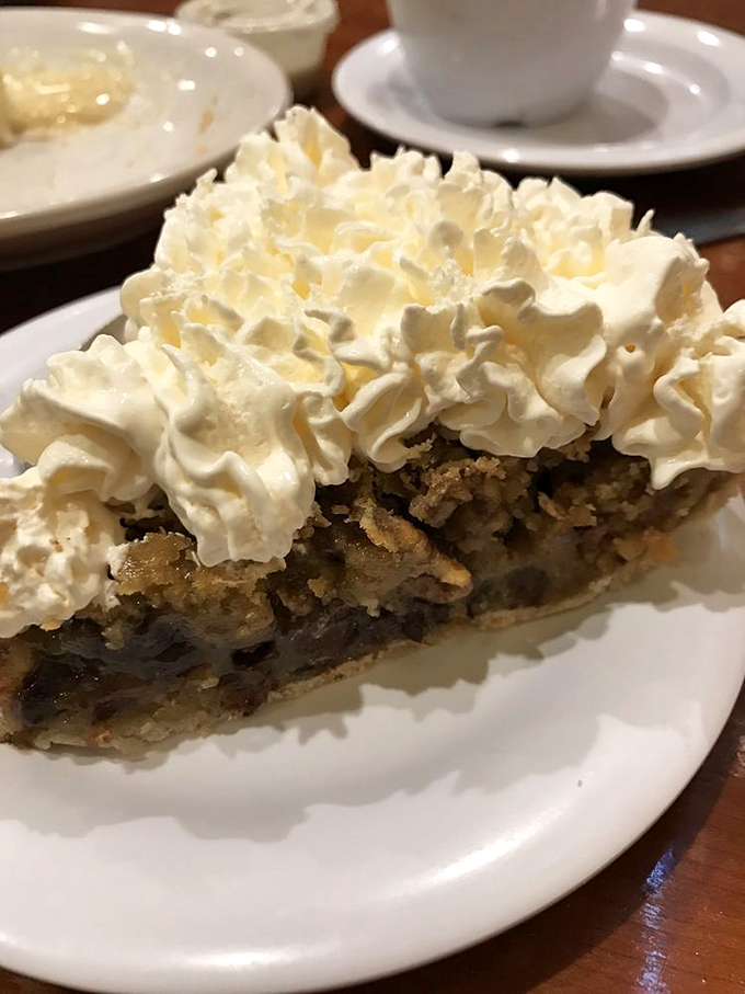 Meet the pie that launched a thousand diet breaks. That mountain of whipped cream isn't just a topping&mdash;it's a fluffy white flag of delicious surrender.