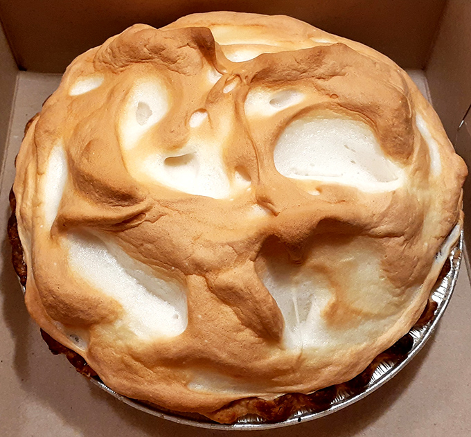 Behold the meringue mountain! This towering creation isn't just dessert&mdash;it's architecture with a sweet tooth and a showstopper's personality.