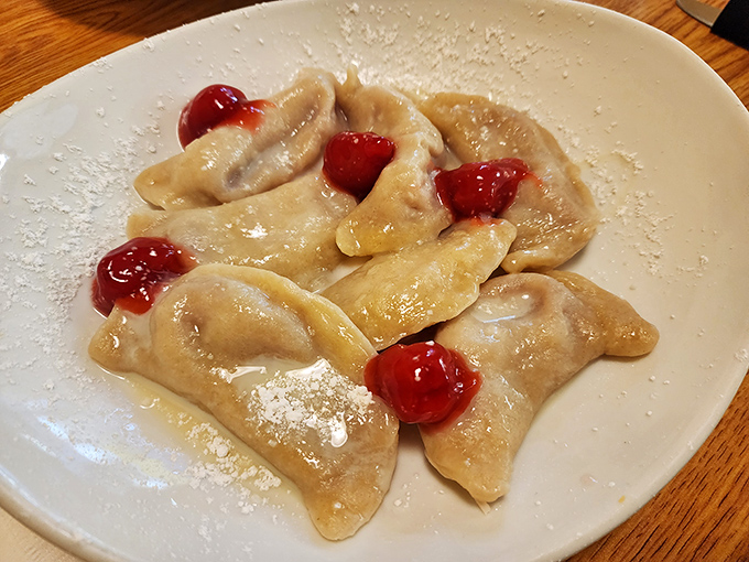 These pierogi look like they're having a party with those cherries. Sweet dumplings that would make your grandmother weep with joy.