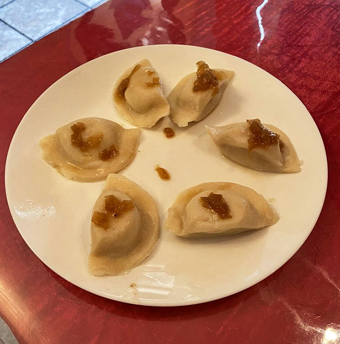 Six perfect pierogi arranged like a delicious clock face. Time stops when these dumplings hit your taste buds.
