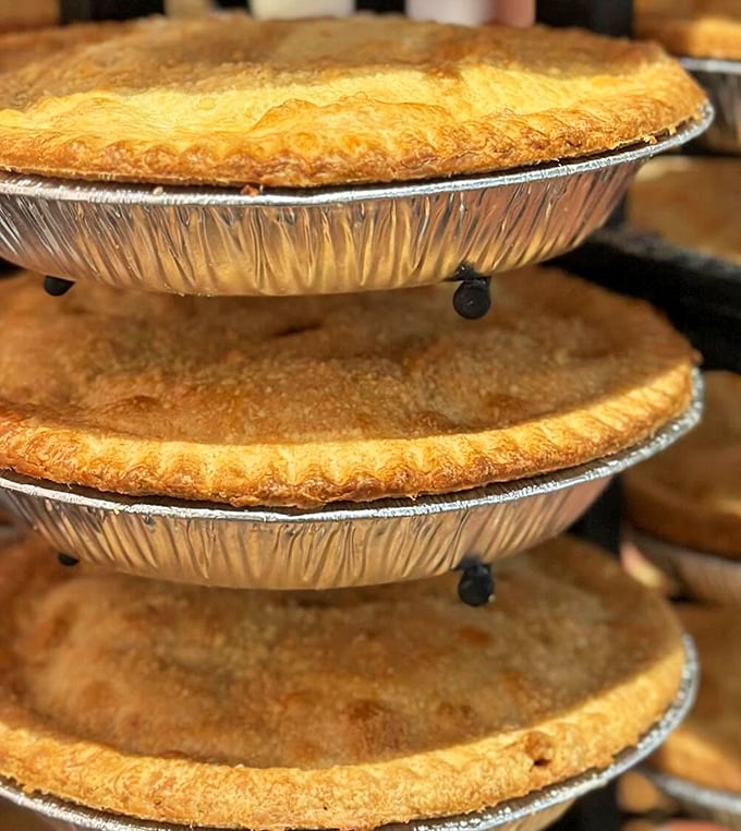 Golden-crusted pies stacked like edible poker chips, except in this game, everyone's a winner no matter which flavor they choose.