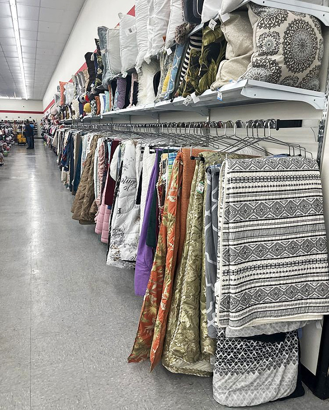 Textile treasures hang like colorful stalactites in a cave of comfort. Your next statement throw or curtain is hiding in plain sight.