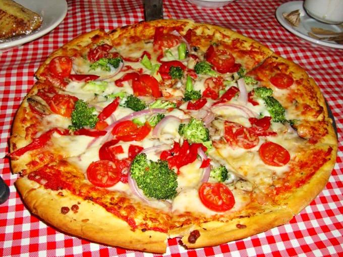 This isn't just pizza&mdash;it's architecture. Load-bearing cheese walls support a neighborhood of vegetables in their delicious little community.